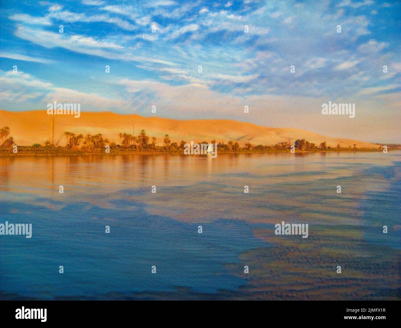 Along the Nile River in Egypt, with blue water, blue sky, and the ...