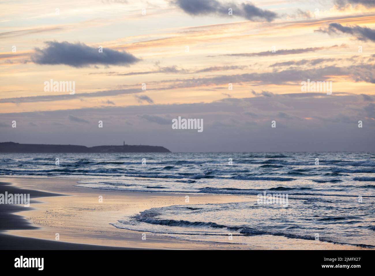 Dramatic sunset on the beach with beautiful colorful sky, Cap Blanc Nez ...