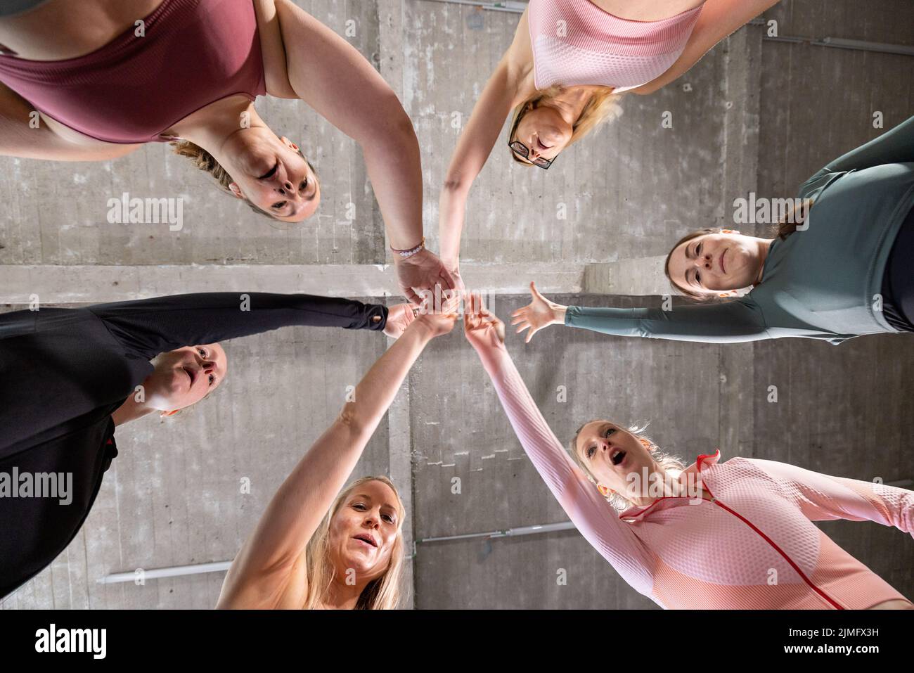 Group of six young motivated sporty girls wearing sports attire ...