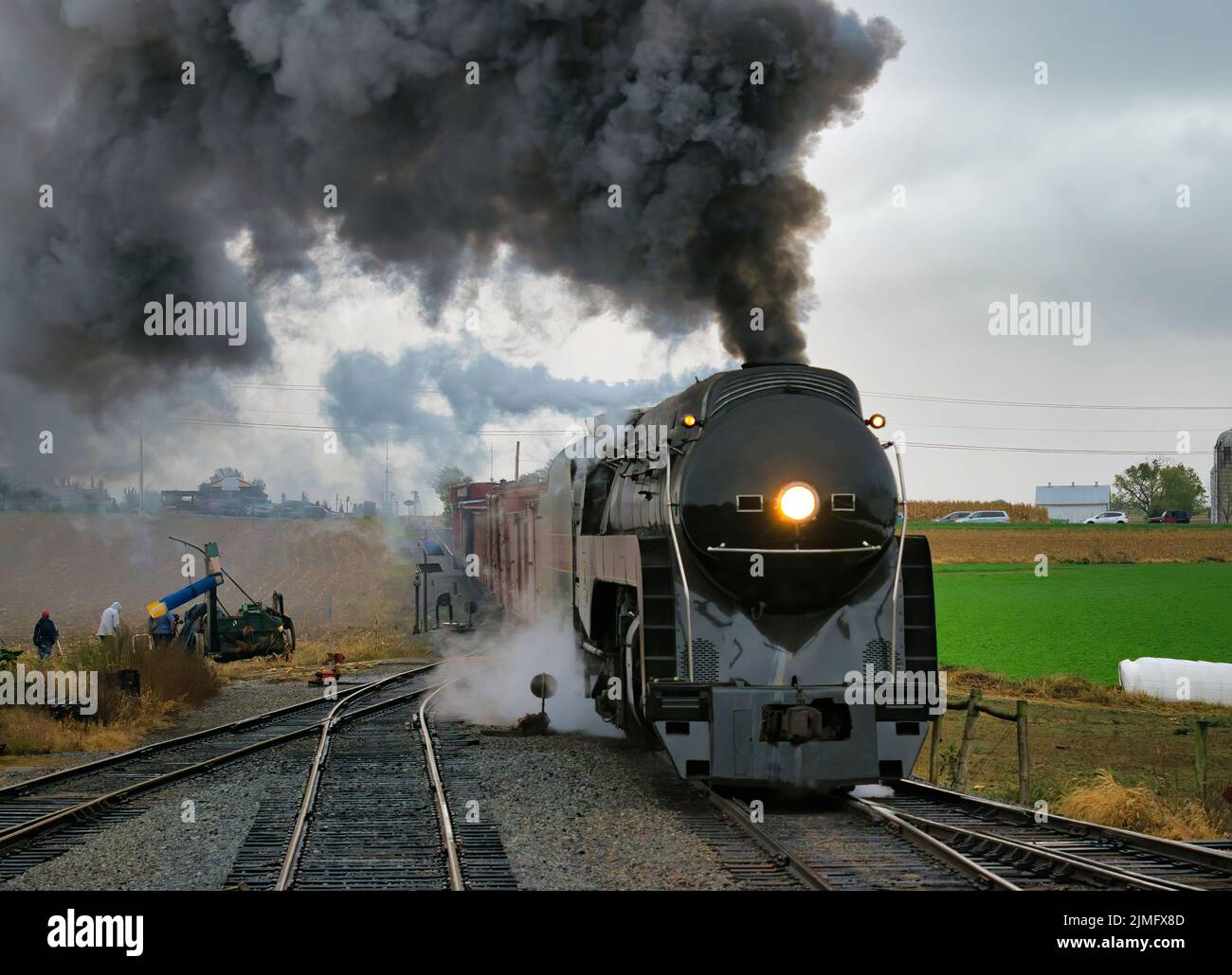 Antique Restored Steam Freight Train Approaching Blowing Smoke and ...