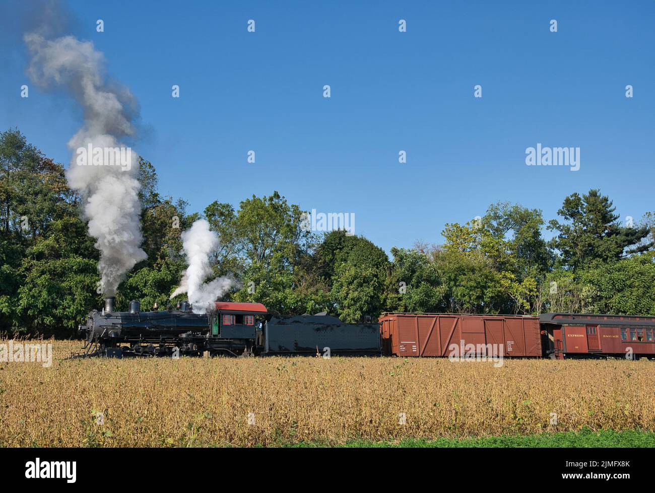 Restored Antique Steam Freight Train Passing Blowing Smoke Stock Photo ...