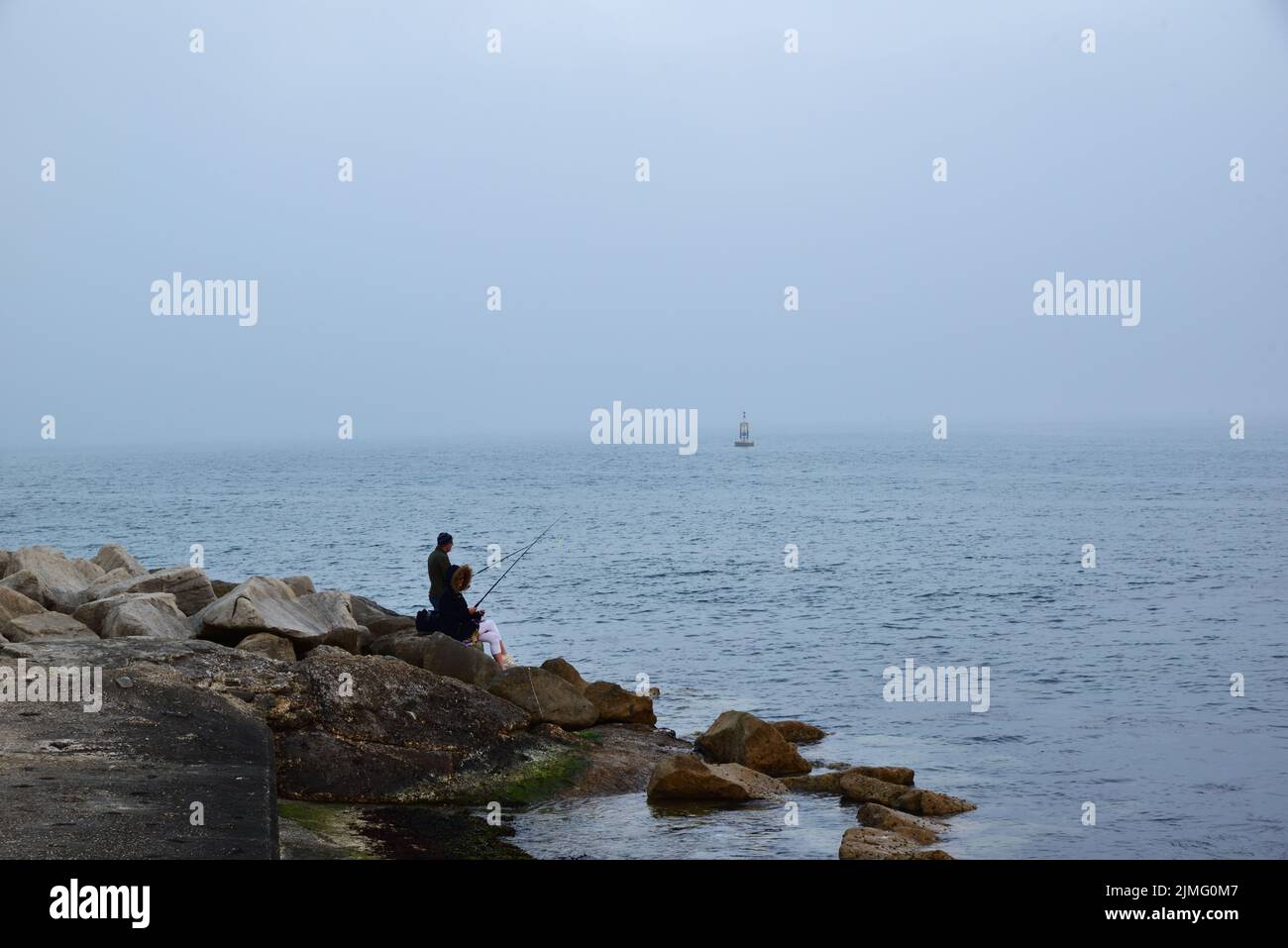 Man woman fishing hi-res stock photography and images - Alamy