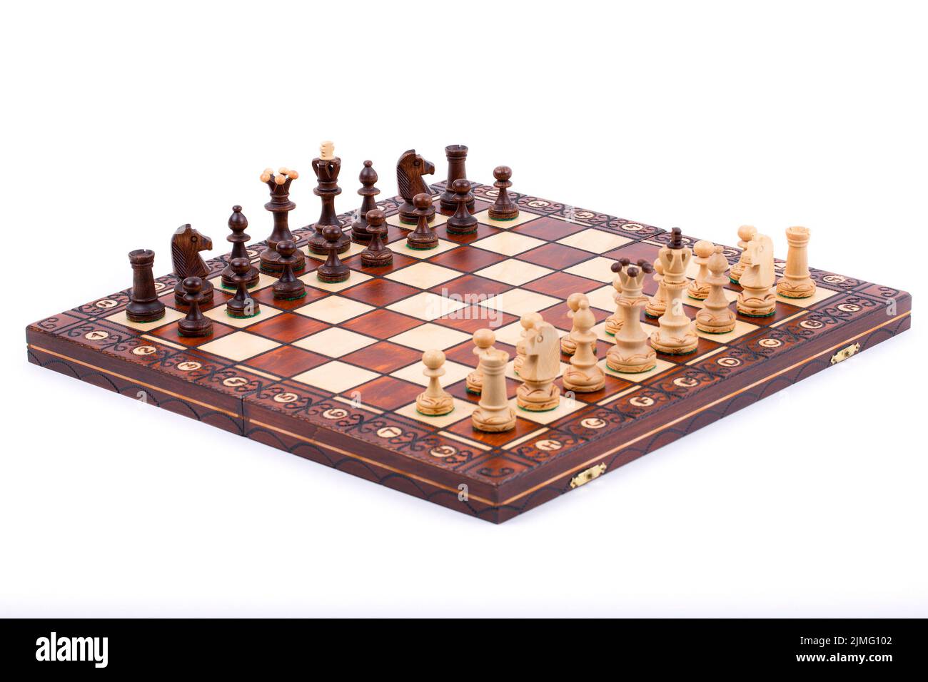 Chess pieces on the board on a white background Stock Photo - Alamy