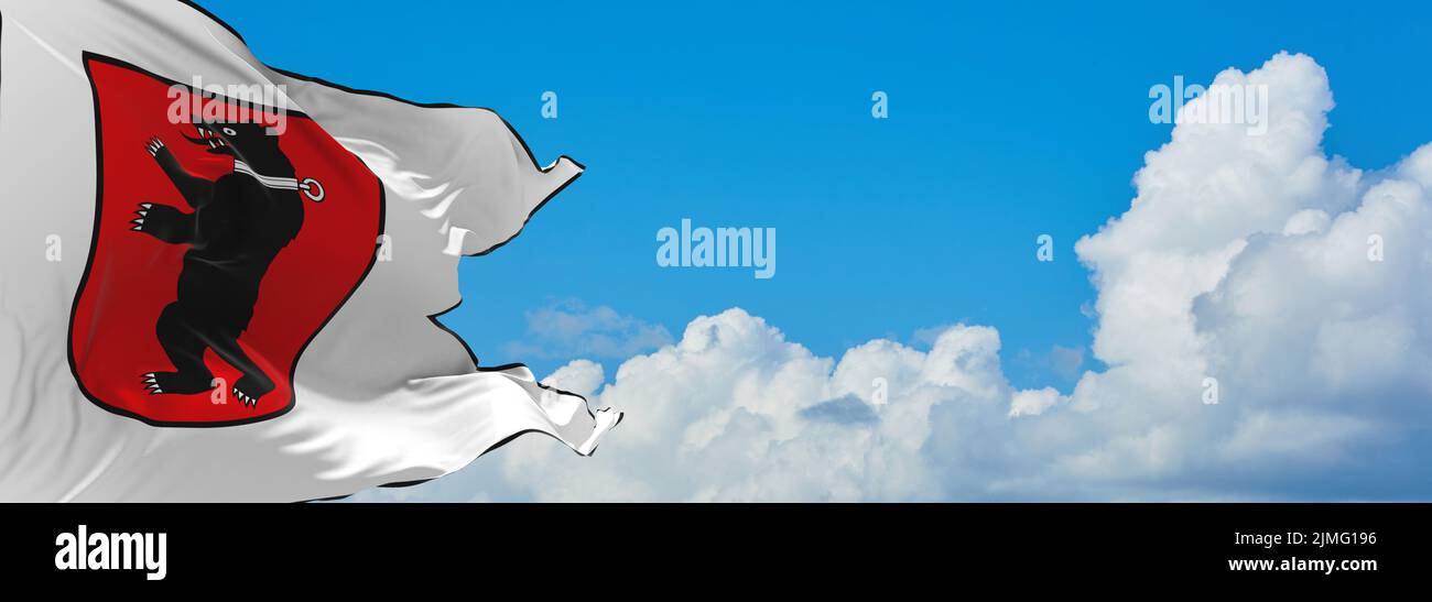 official flag of Samogitia lithuania at cloudy sky background on sunset ...