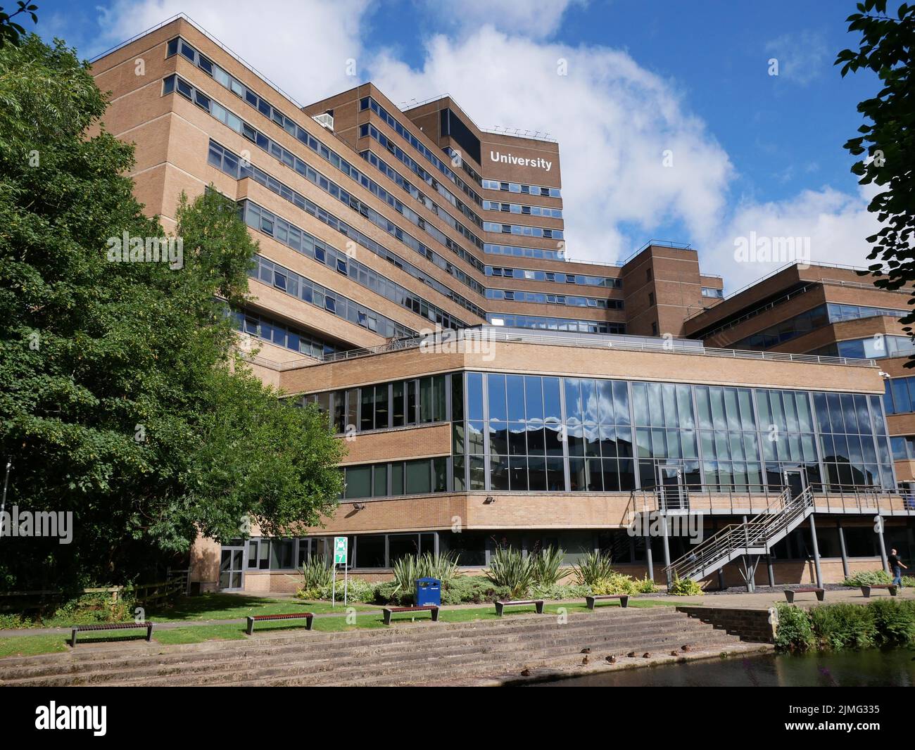 Brick built multi story university building with rows of windows some ...