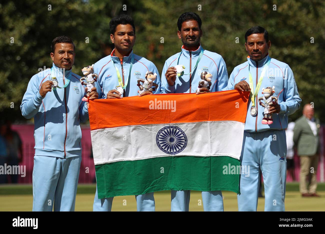 India’s Silver medalists Sunil Bahadur, Navneet Singh, Chandan Kumar Singh and Dinesh Kumar pose ...