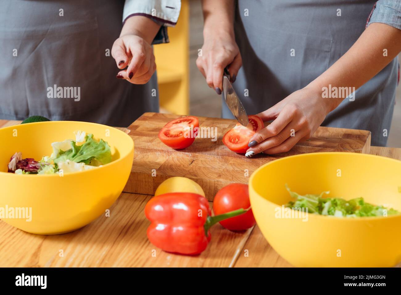 women making salad healthy nutrition lifestyle Stock Photo - Alamy