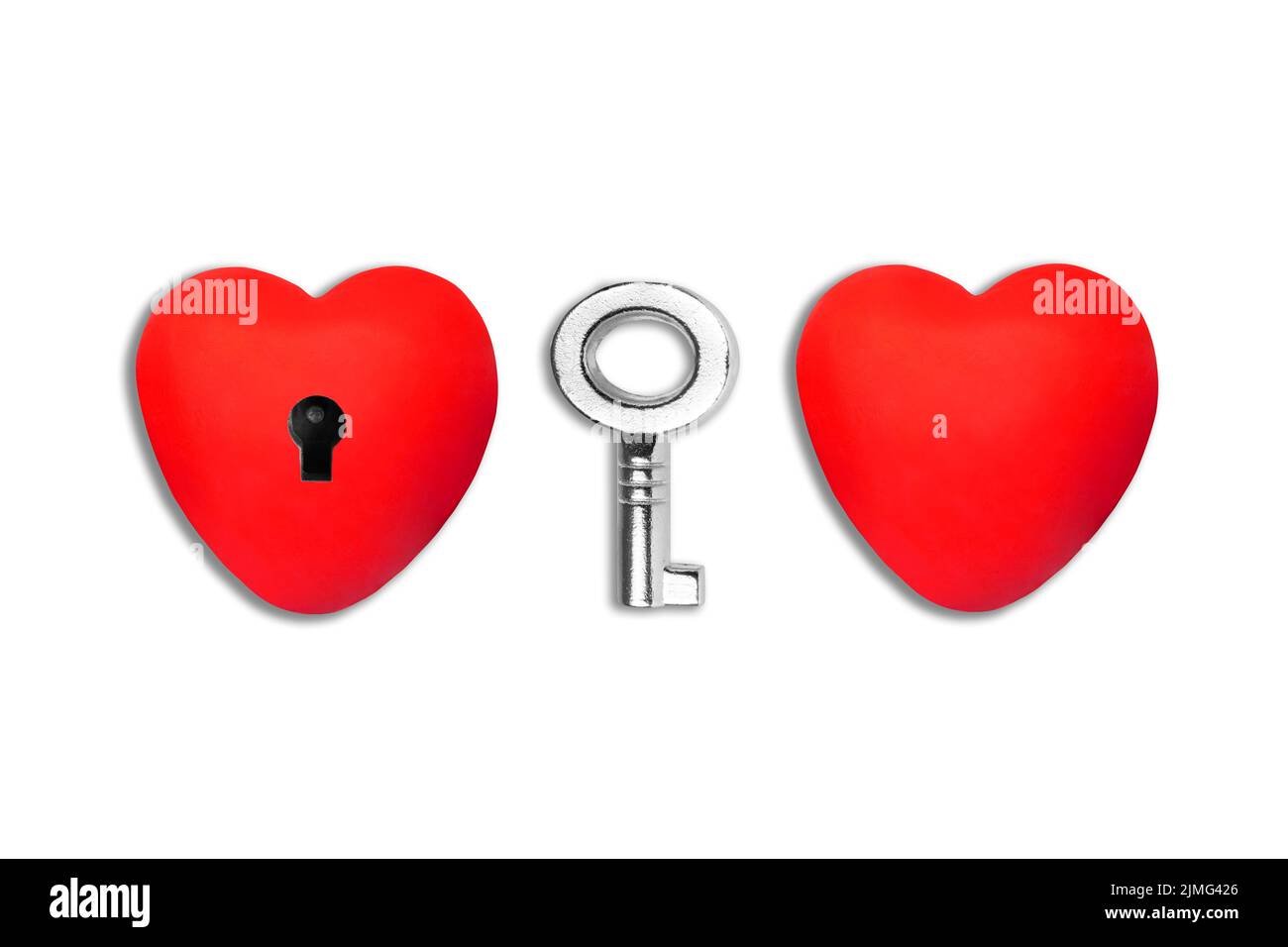 Red heart shapes and key isolated on white background. One heart has a ...
