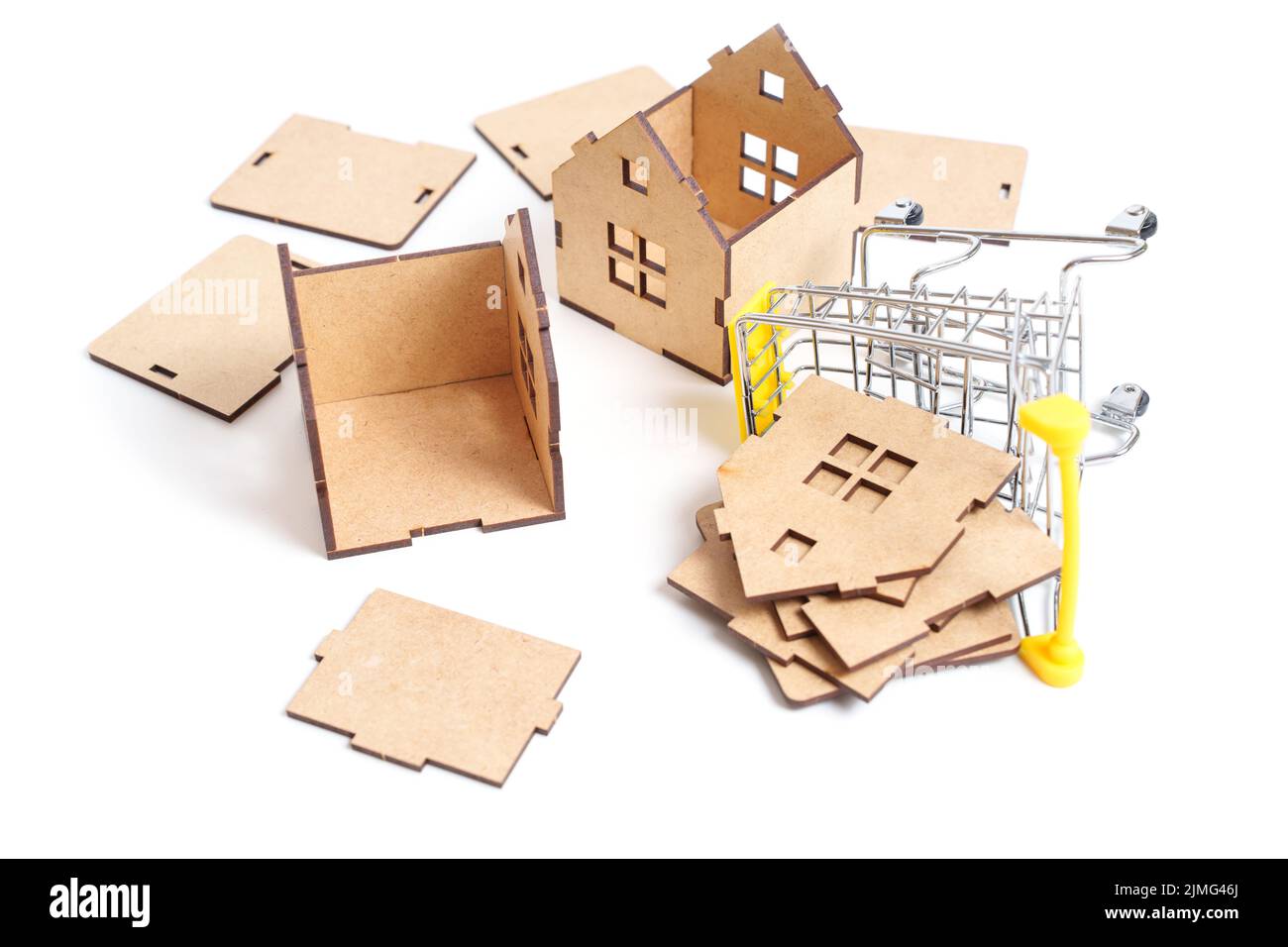 Assembling wooden toy houses using the panels delivered in a miniature ...