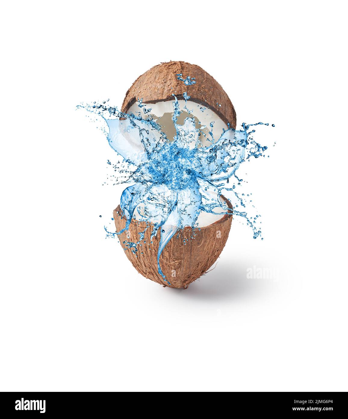 Coconut splashing into refreshing coconut milk hi-res stock photography ...