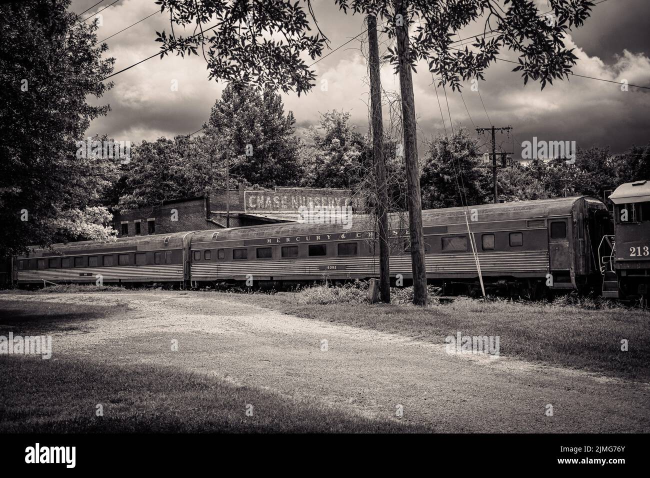 Old train in front of an abandoned factory Stock Photo - Alamy