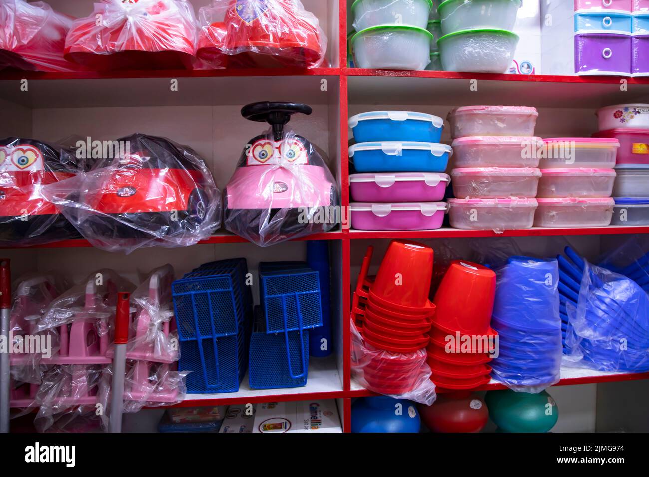 Colorful Varieties Plastic houseware products on the supermarket Shelf ...