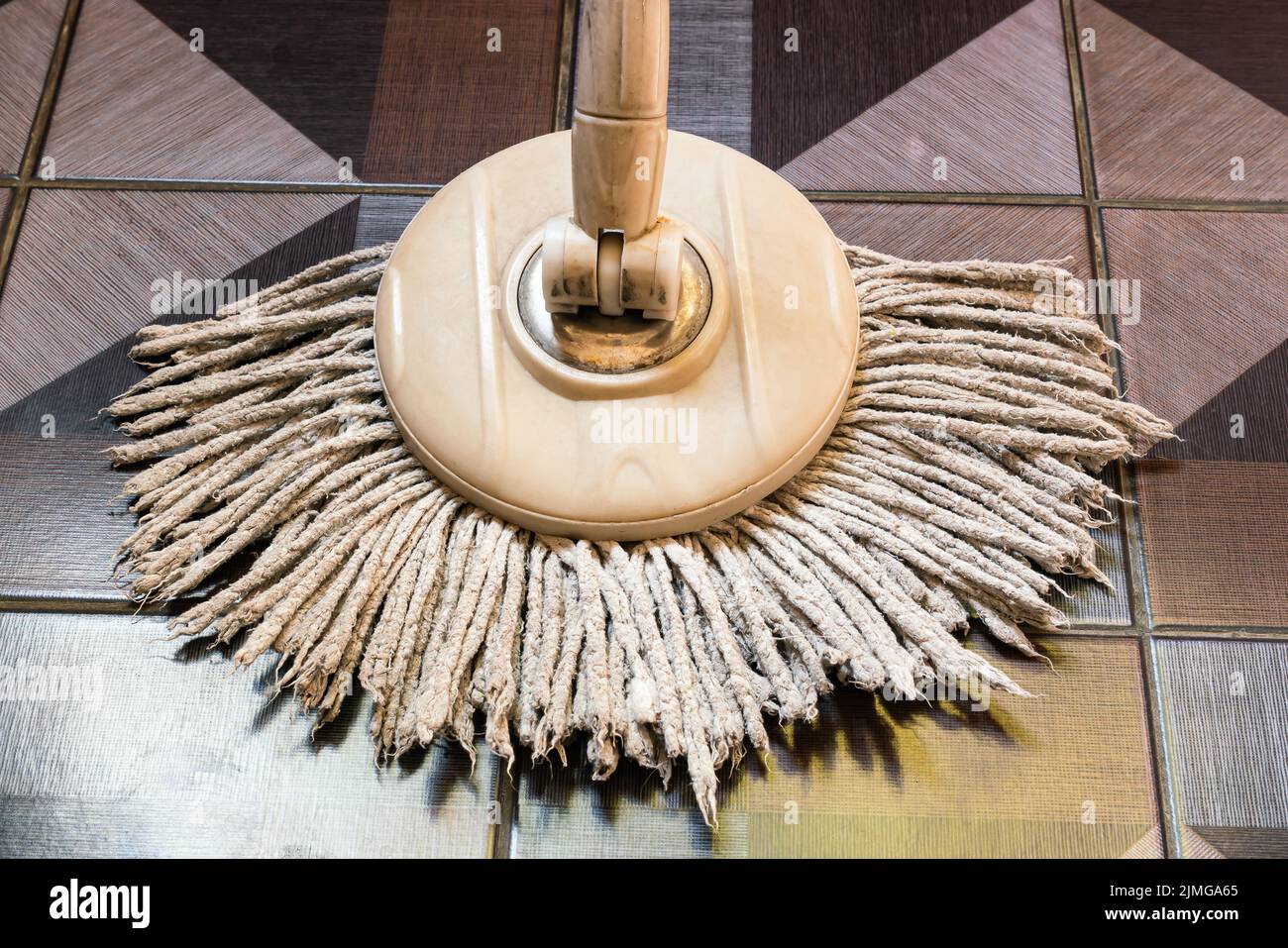 View of used round spin mop with micro fiber head Stock Photo - Alamy