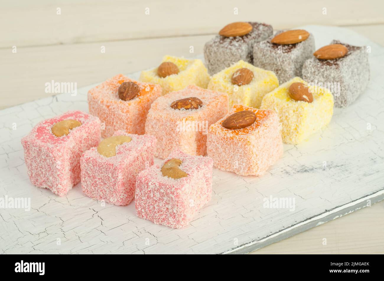 Multicolored Turkish delight, lokum with different flavors on white ...