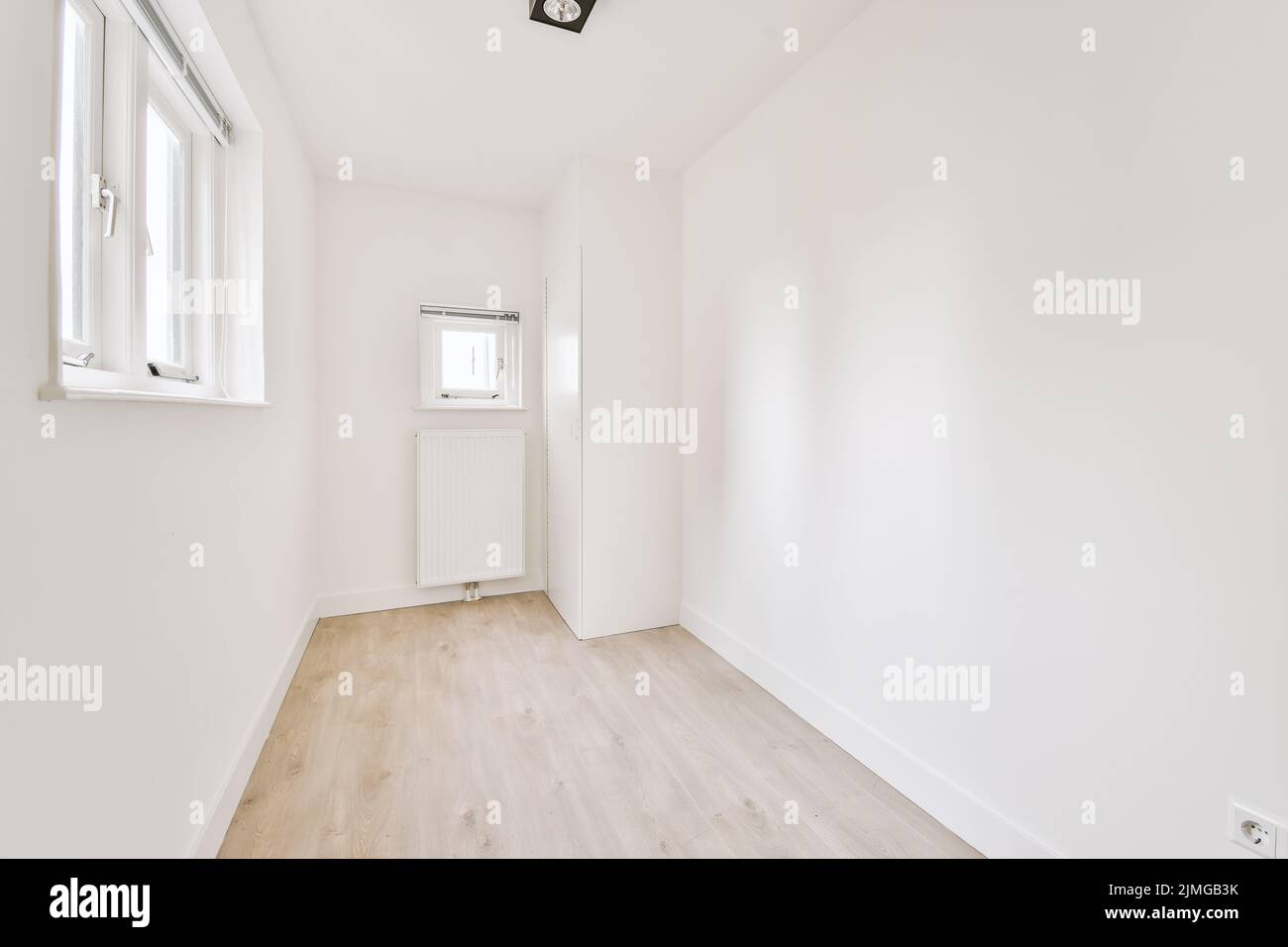 A cozy and narrow empty room in a luxury house Stock Photo - Alamy