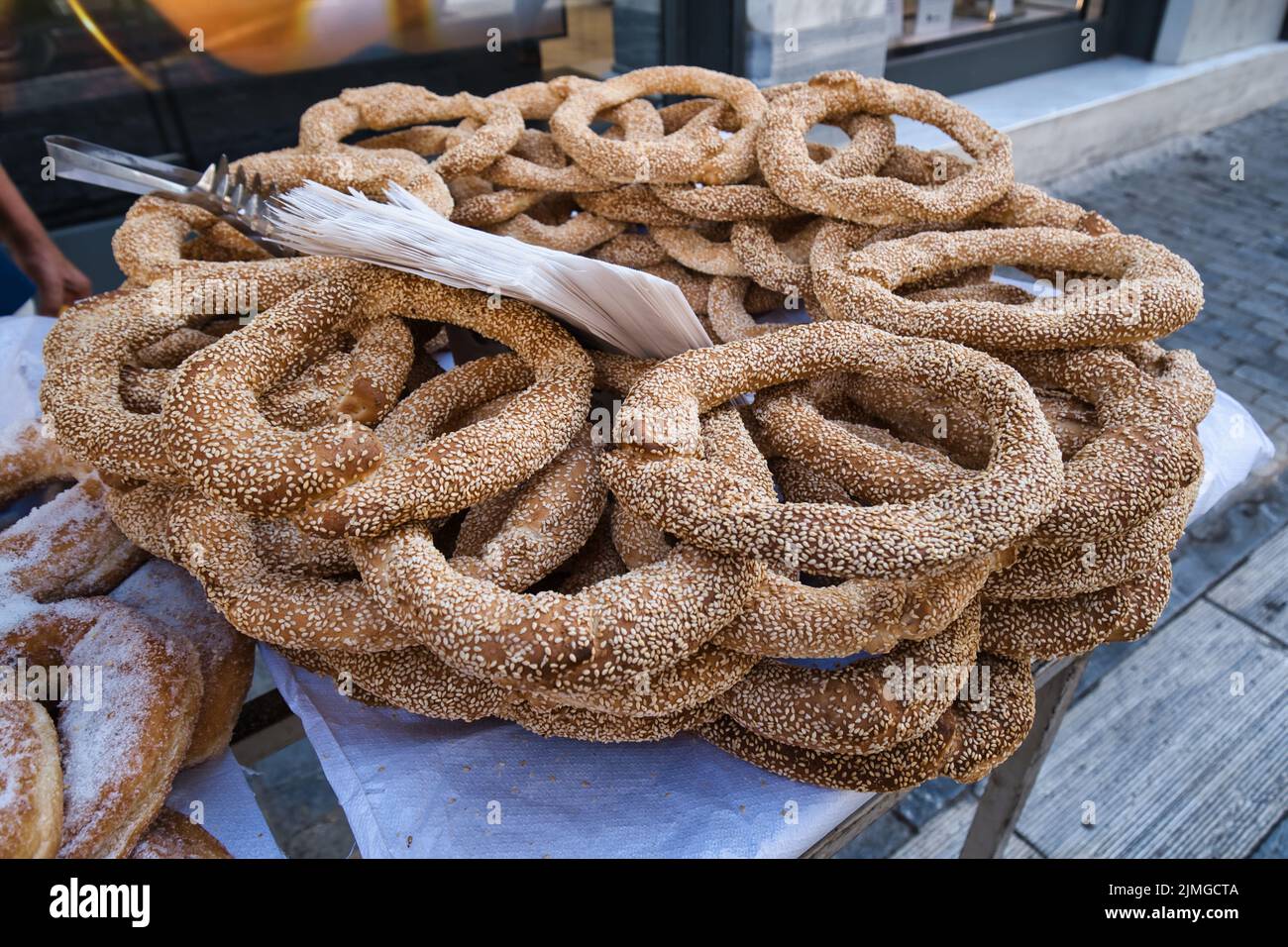 Stack of koulouri thessaloniki bread circles in a street of Athens ...