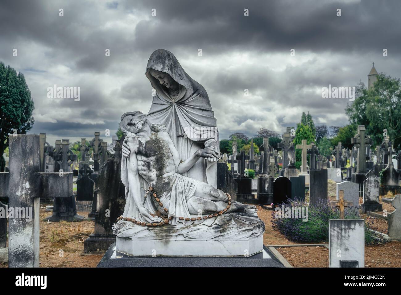 Sculpture of Mary holding dying Jesus Christ, Glasnevin Cemetery ...