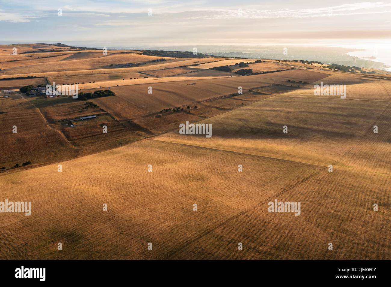 Stunning aerial drone landscape image of golden hour over farmers ...