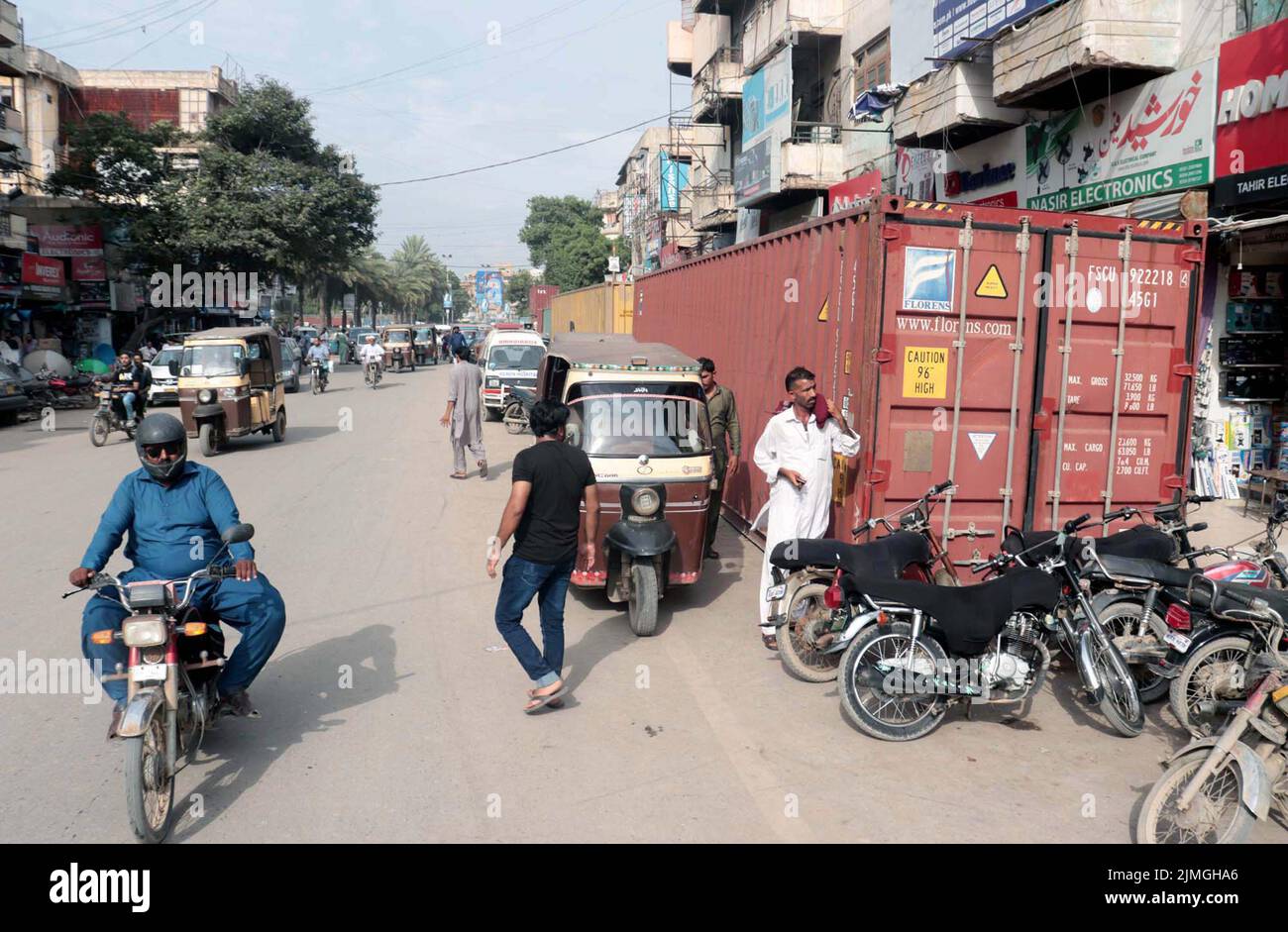 Containers are being placed by Sindh Police as the security ...