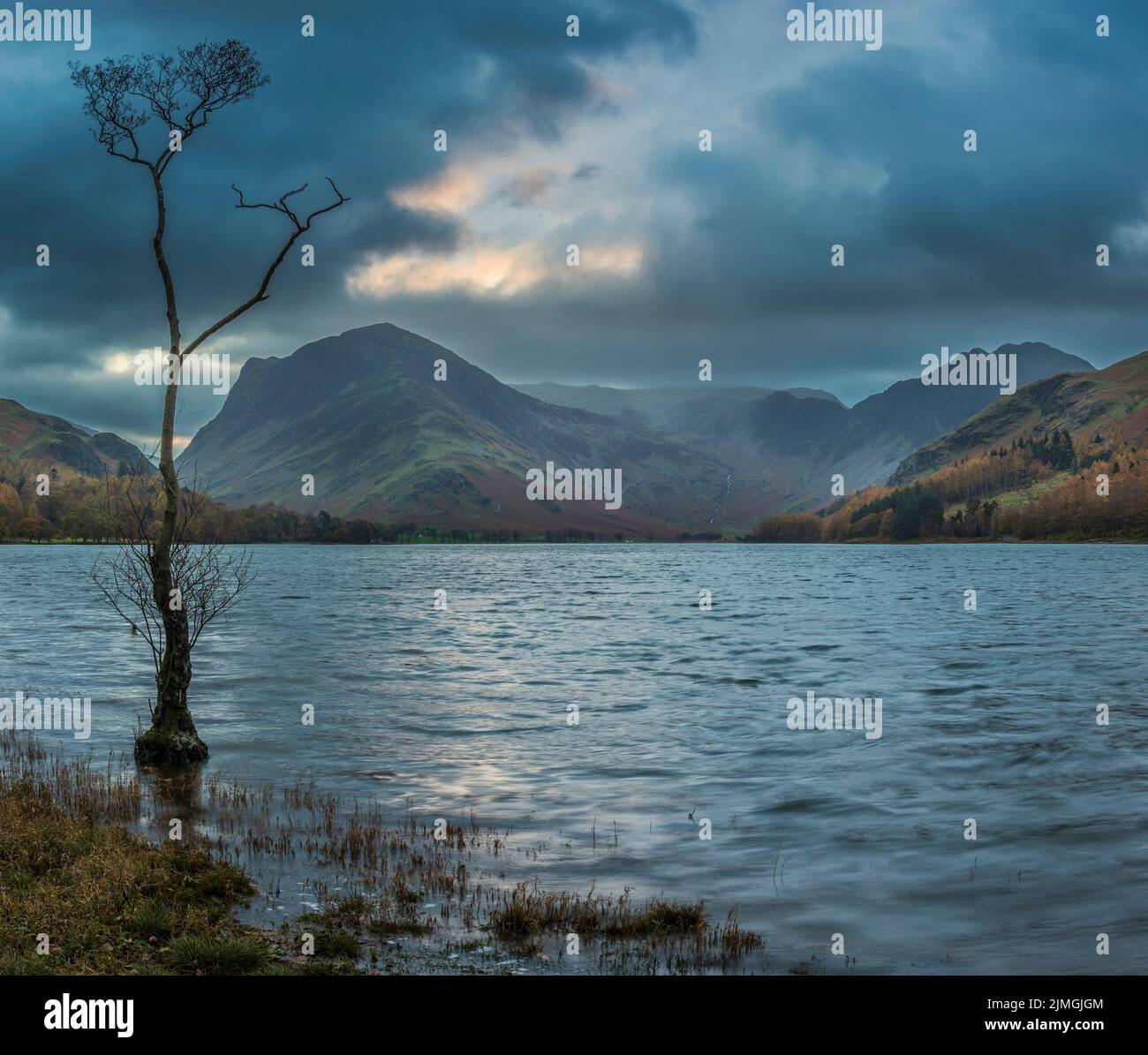 Stunning Autumn sunrise landscape image of Buttermere in Lake District ...