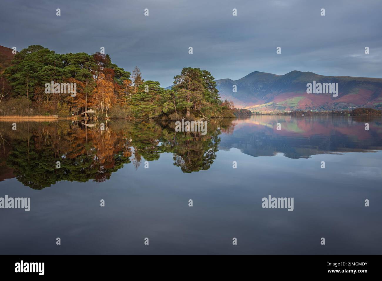 Epic Autumn sunrise landscape image looking from Manesty Park in Lake ...