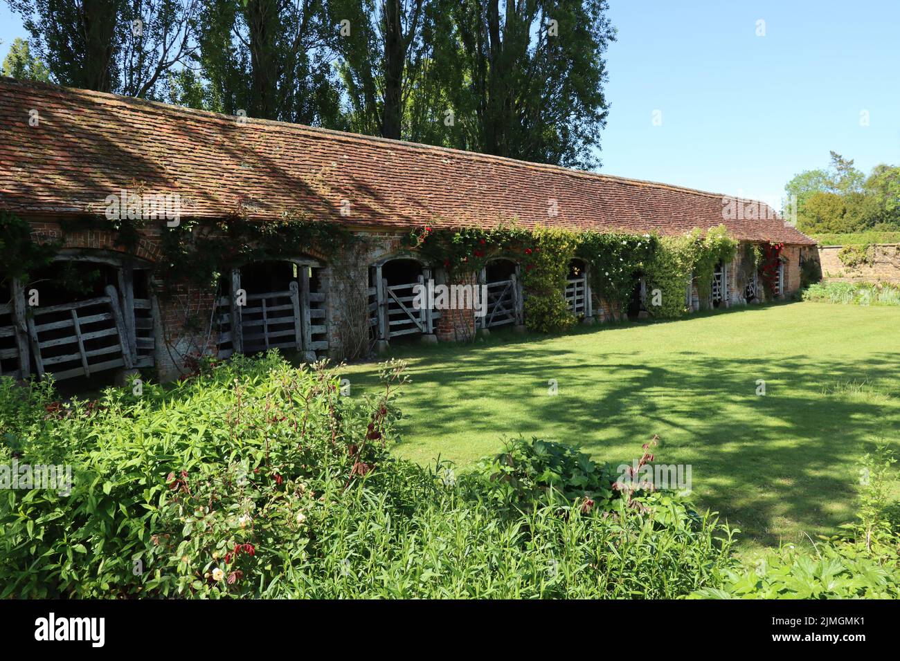 The old stable block in the grounds of an English country house Stock ...