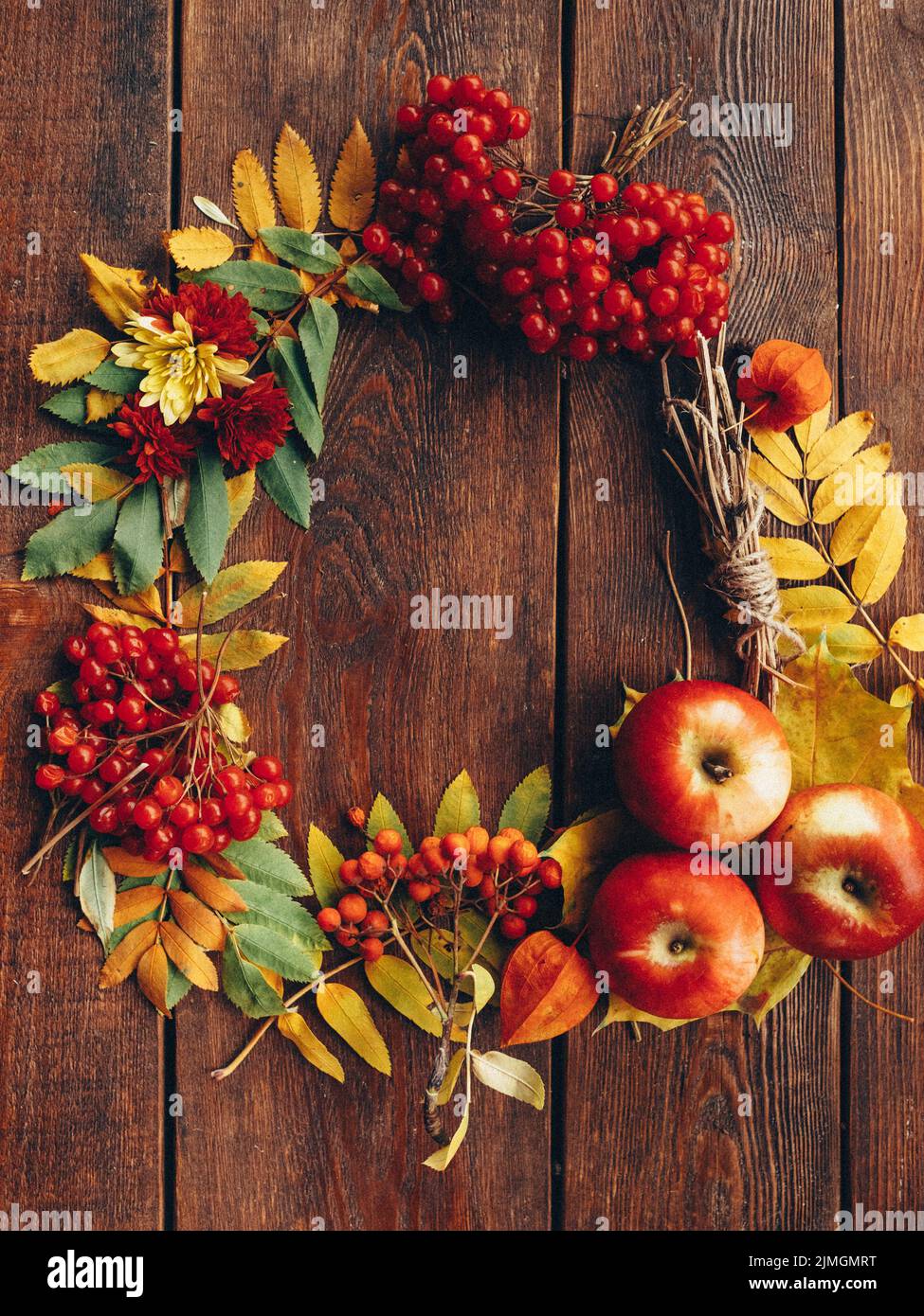 autumn wrench fall plants frame wooden background Stock Photo - Alamy