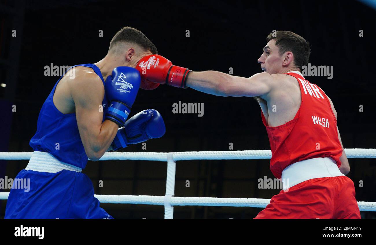 Northern Ireland's Aidan Walsh (Red) and Wales's Garan Croft (Blue) in ...