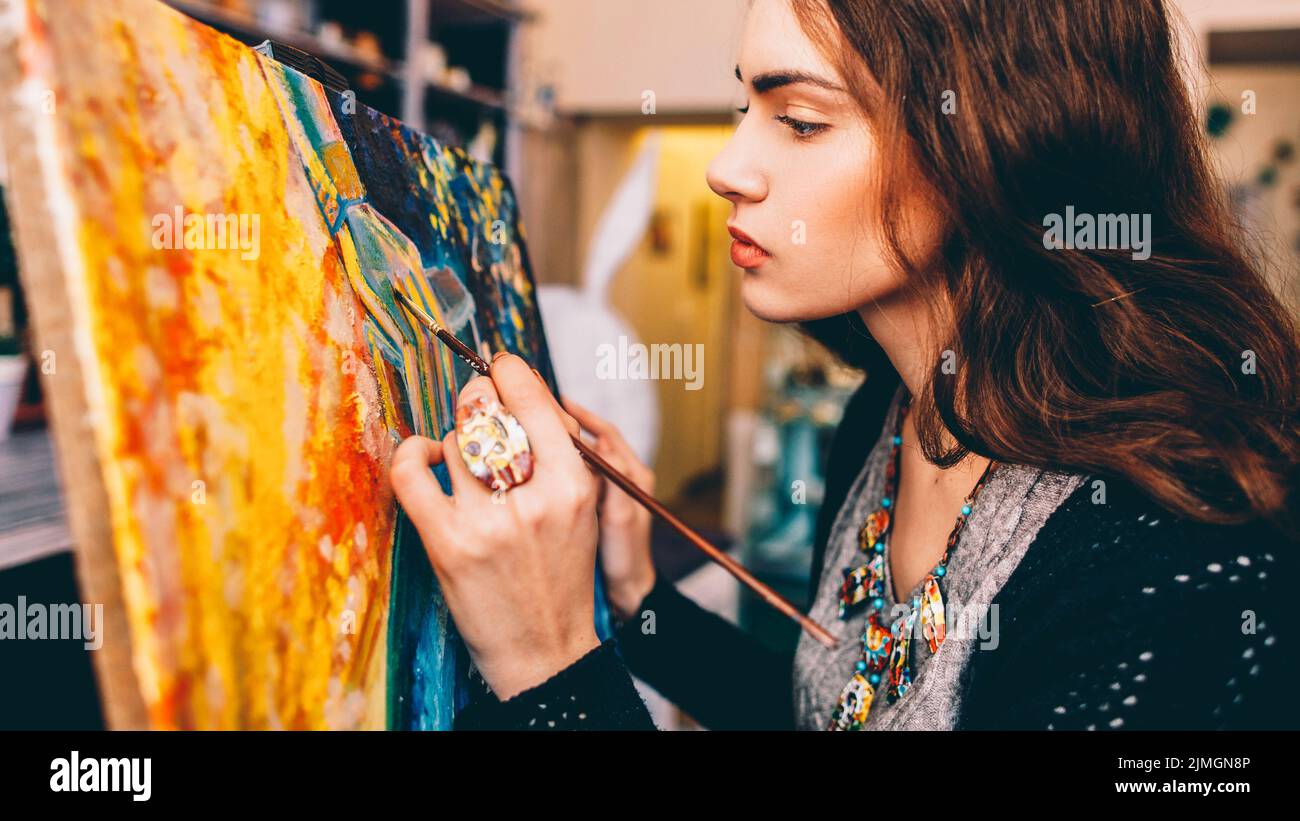 art school class painter creating abstract artwork Stock Photo - Alamy
