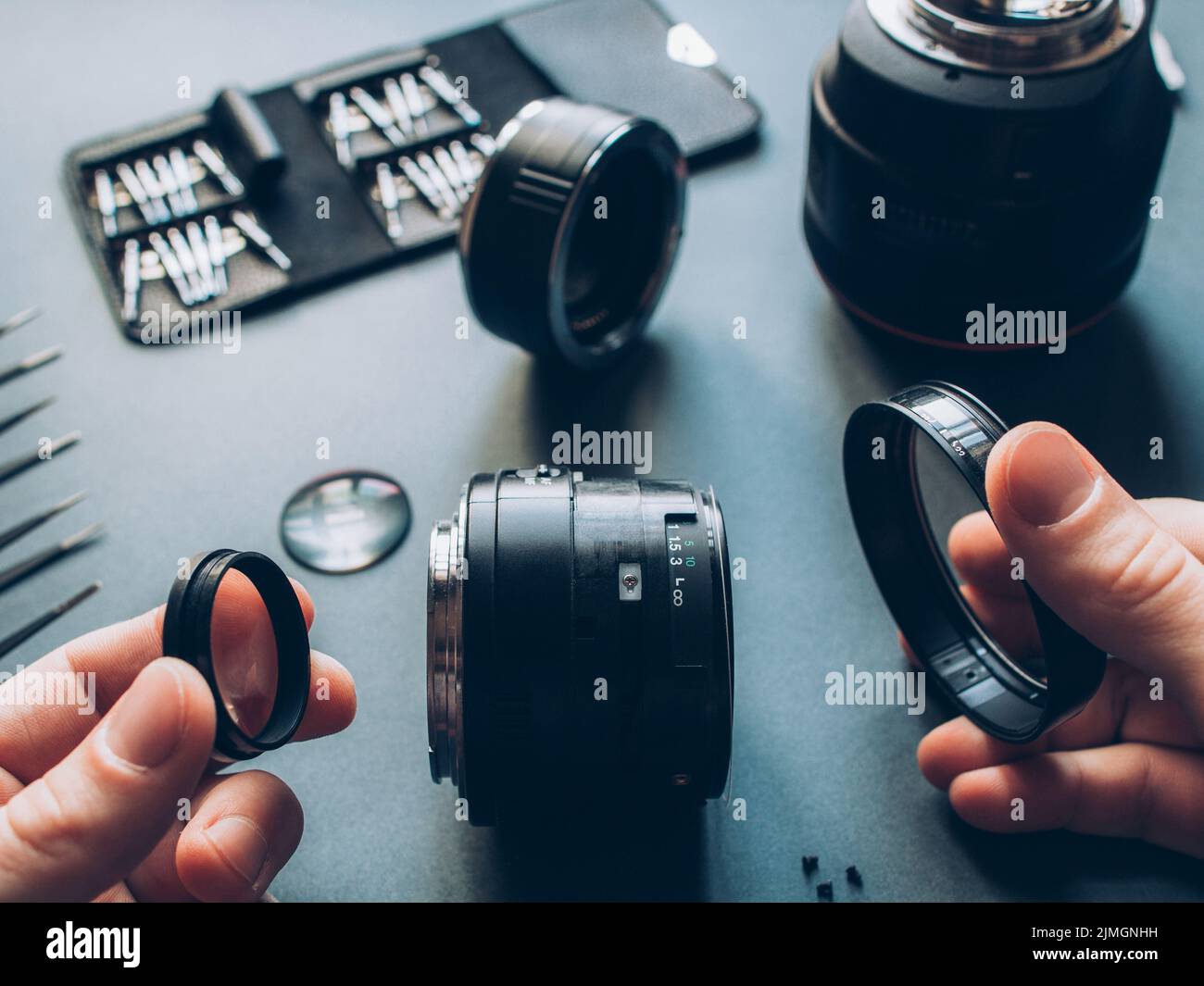 Electronic device maintenance. Top view of man hands repairing photo ...