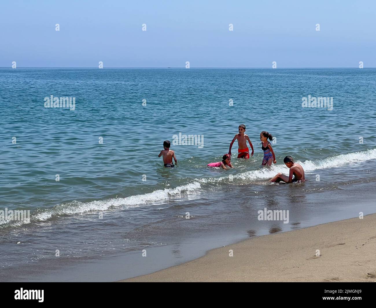 Diverse children group playing hi-res stock photography and images - Alamy