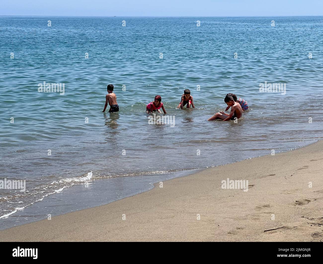 Diverse children group playing hi-res stock photography and images - Alamy