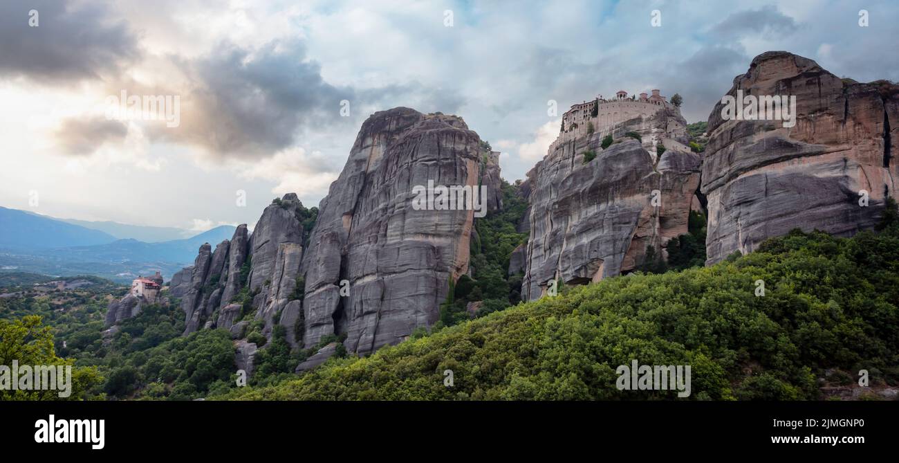 Meteora Greece. Varlaam Holy Monastery buildings on top of rocks, blue ...