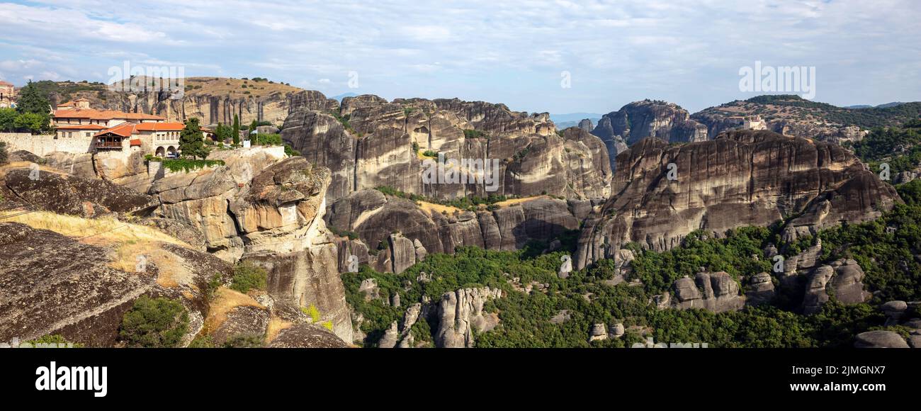 Meteora Greece rocky landscape. Holy Trinity Agia Trias Monastery. Blue ...