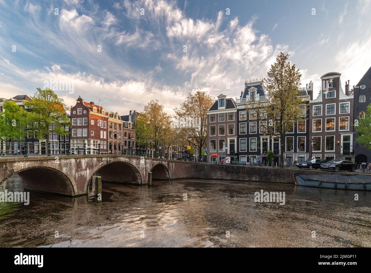 Amsterdam Netherlands, sunset city skyline of Dutch house at canal ...