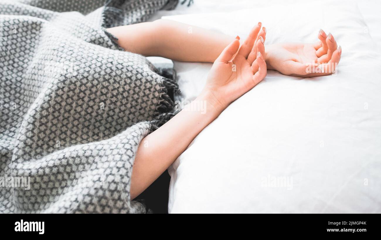 leisure recreation woman sleeping covered face Stock Photo - Alamy