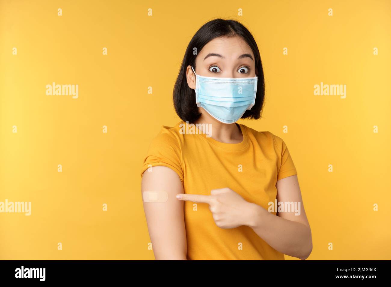 Vaccination from covid and health concept. Excited asian woman in ...