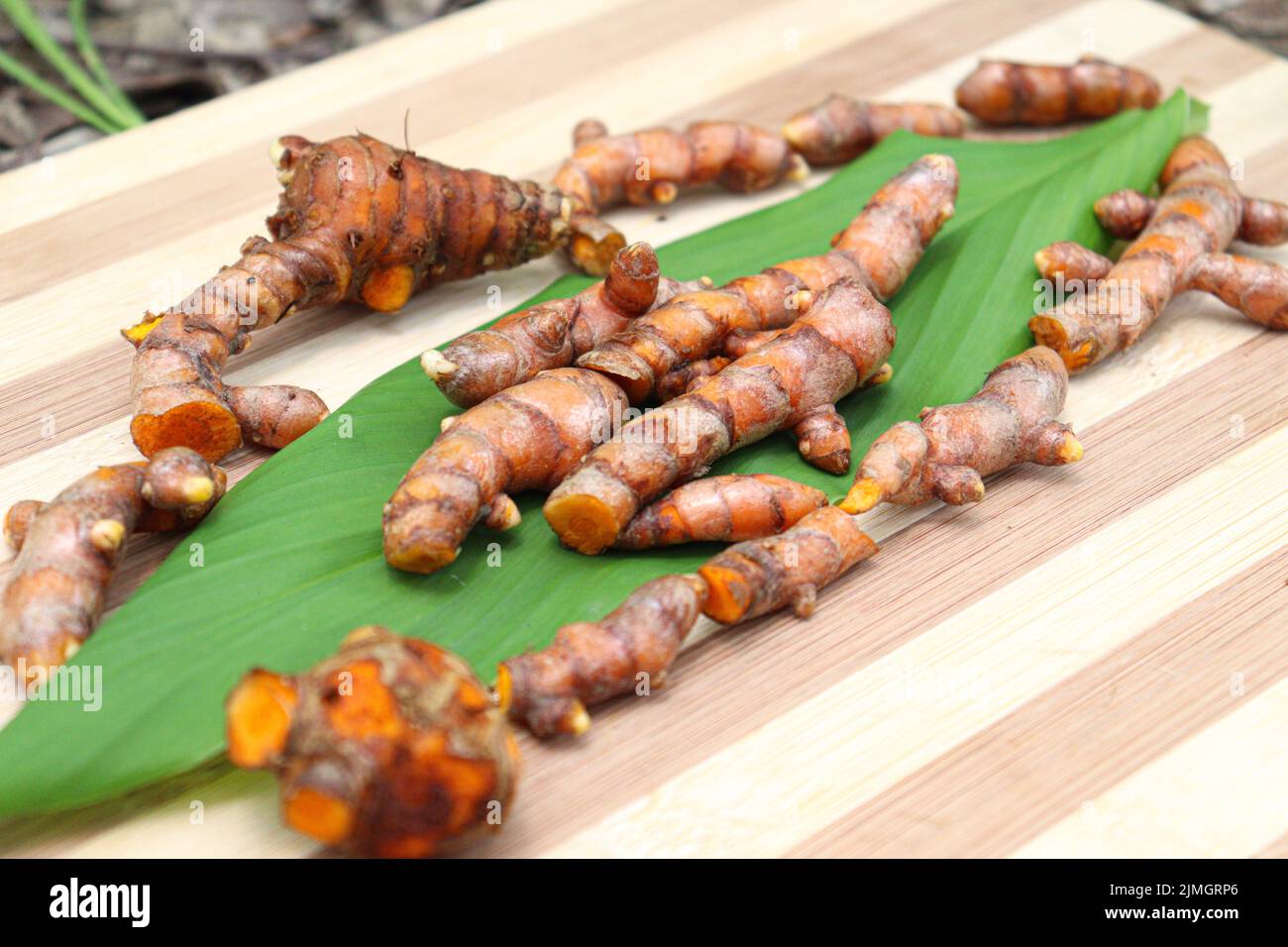 raw turmeric stock with leaf on farm for harvest Stock Photo - Alamy