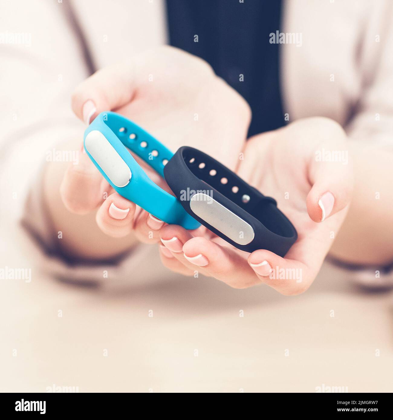 fitness tracker smart bracelets hands technology Stock Photo - Alamy