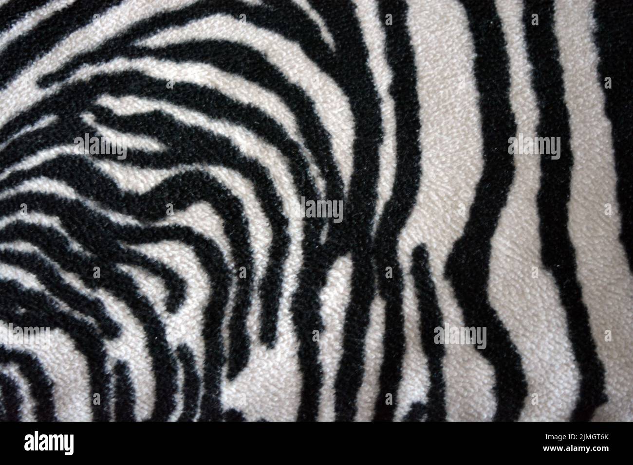 Soft, pleasant, fluffy fabric in the form of zebra, white tiger colors ...