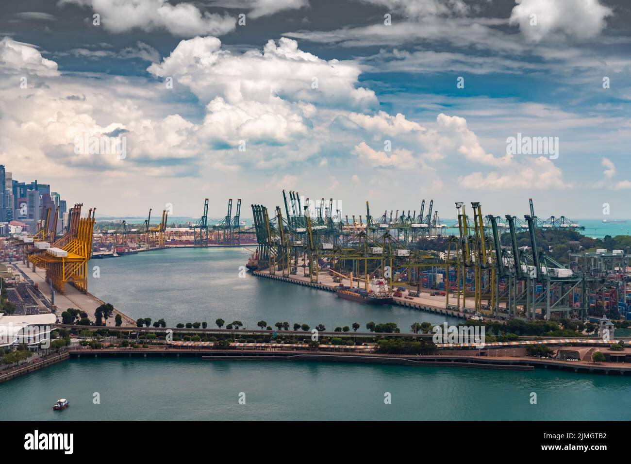 The huge busiest logistic port in Singapore, plenty of cranes to move ...
