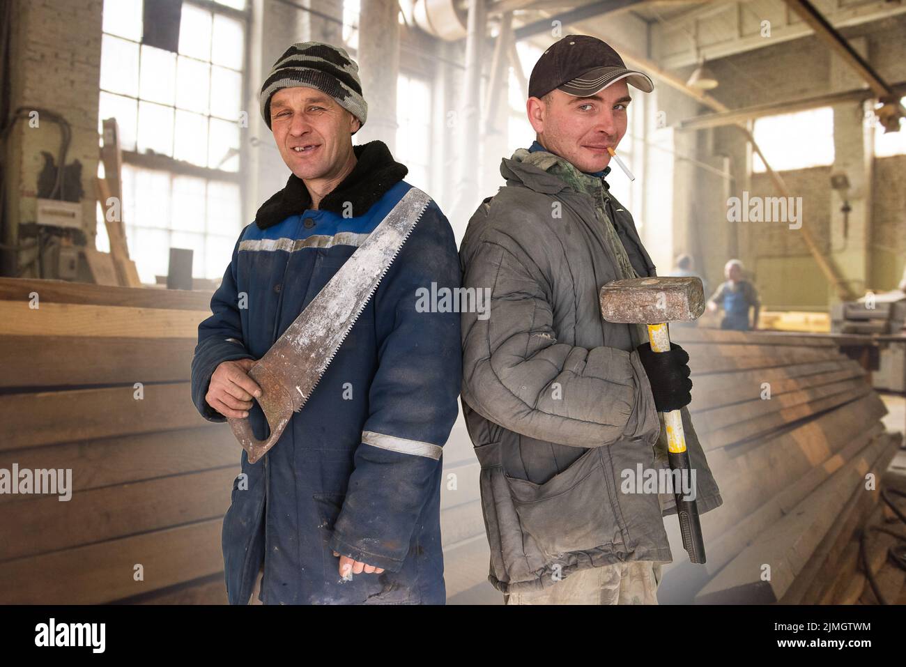Two bad unskilled builder workers Stock Photo - Alamy