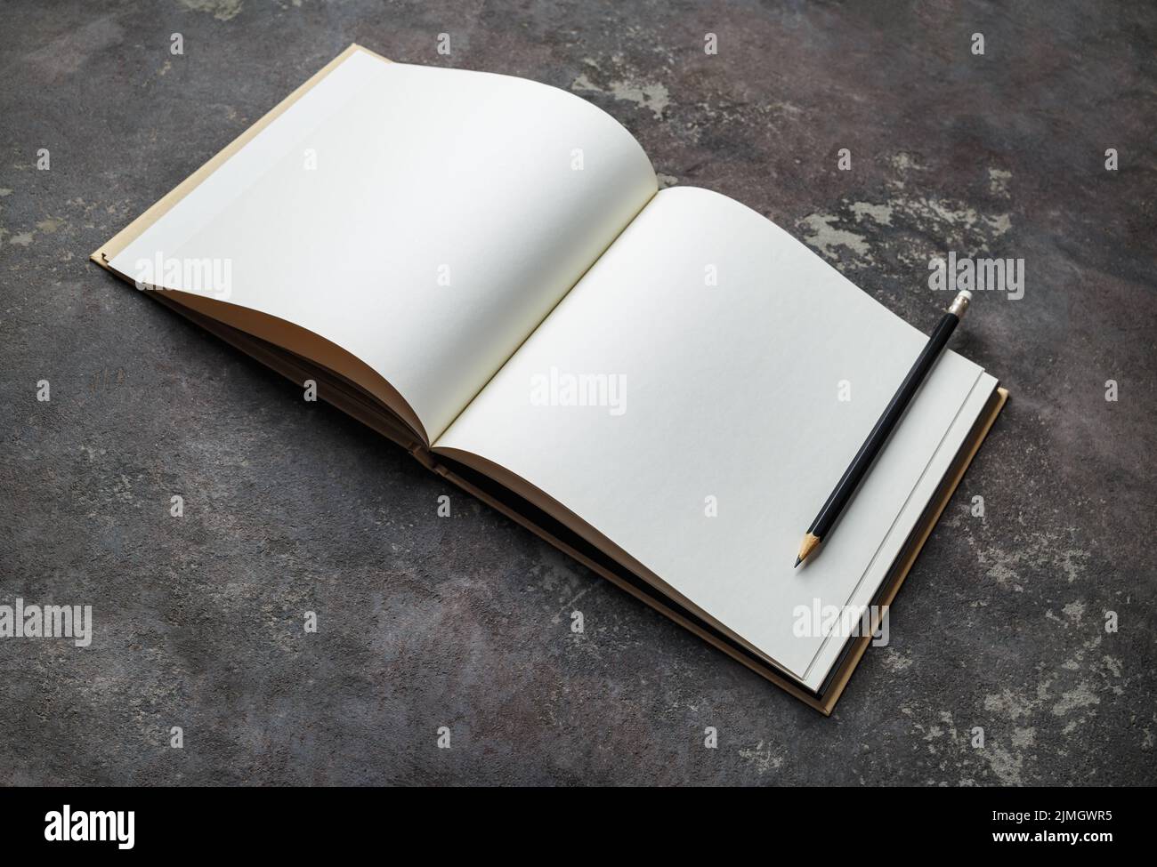 Brochure and pencil Stock Photo - Alamy