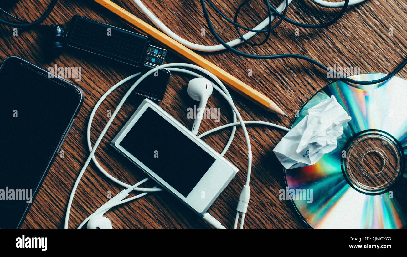 modern lifestyle technology progress desk chaos Stock Photo - Alamy