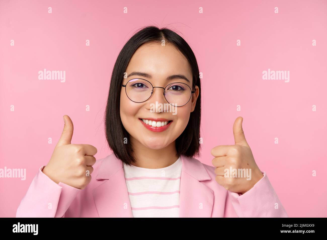 Awesome, congrats. Face of excited asian businesswoman in glasses ...