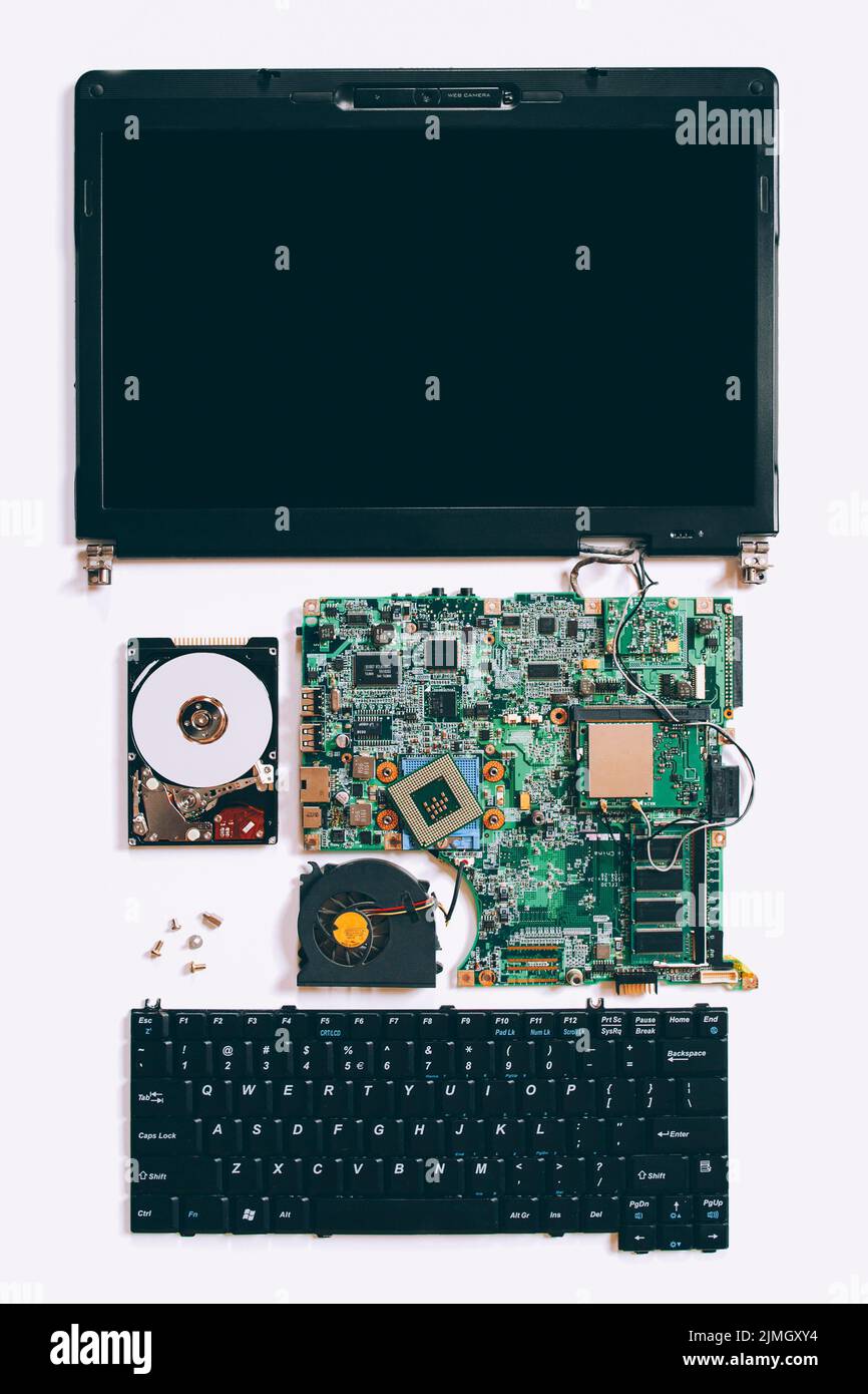 tech support disassembled laptop electronic parts Stock Photo - Alamy