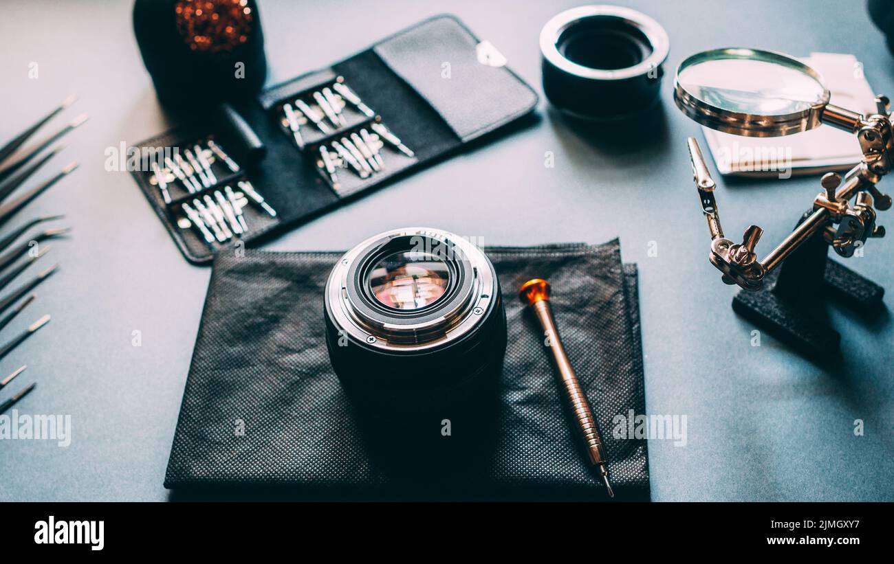 tech maintenance support photo camera lens tools Stock Photo - Alamy