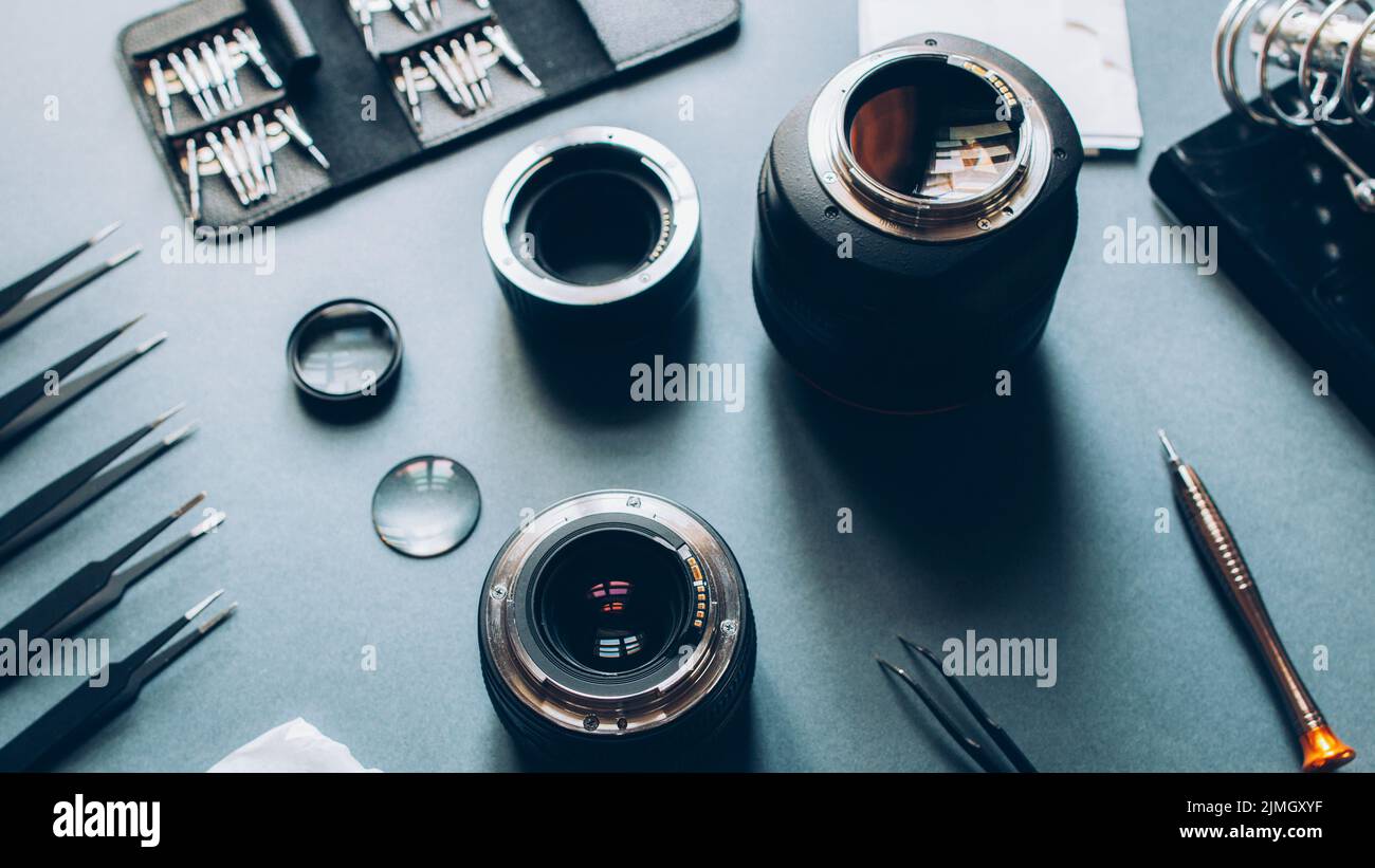 electronic device service photo camera lens repair Stock Photo - Alamy