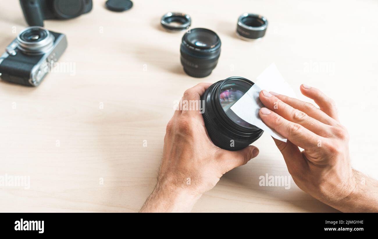 photographing equipment care service camera lens Stock Photo - Alamy