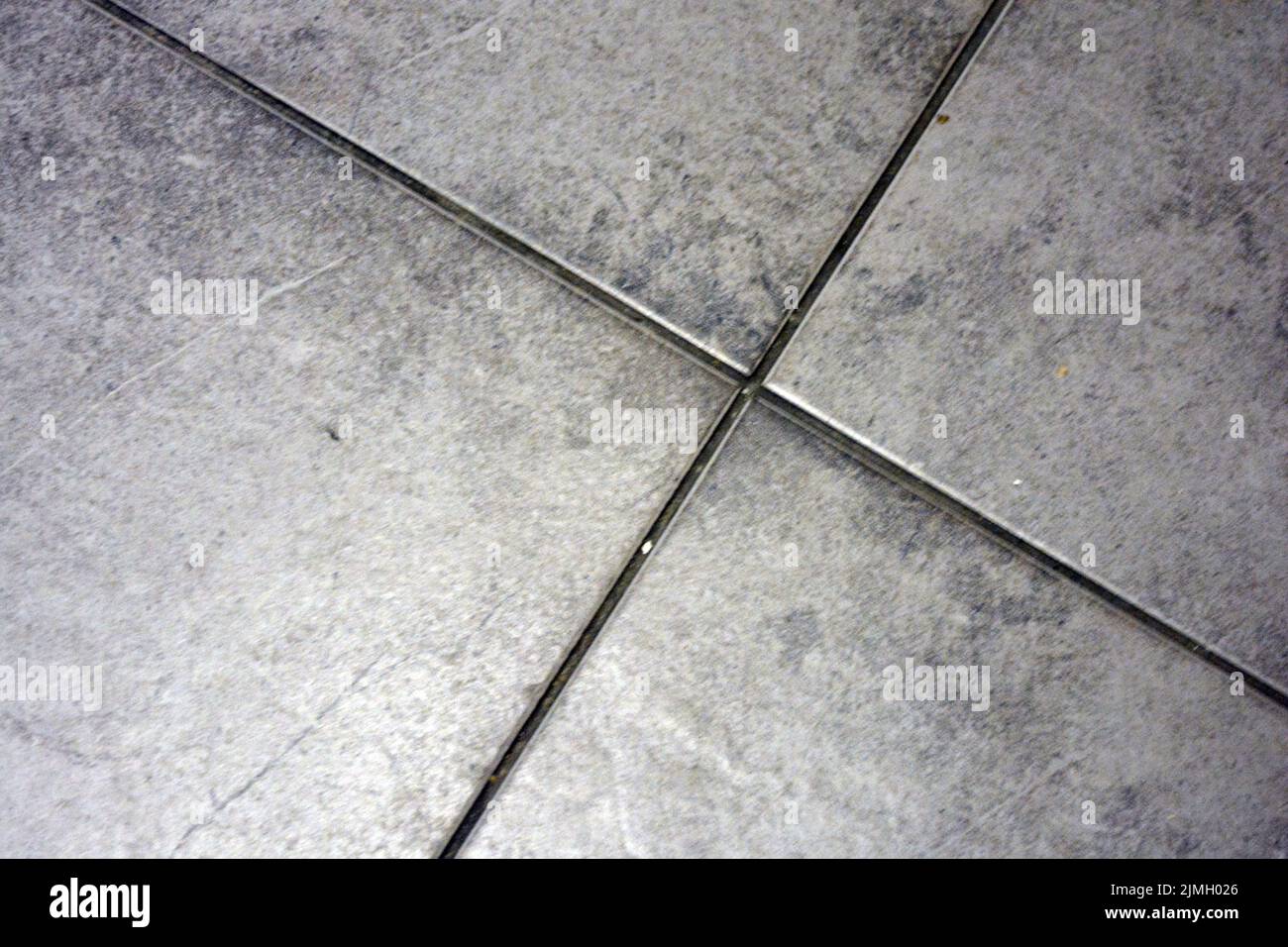 Construction materials, large gray stone tiles laid on the floor of the ...